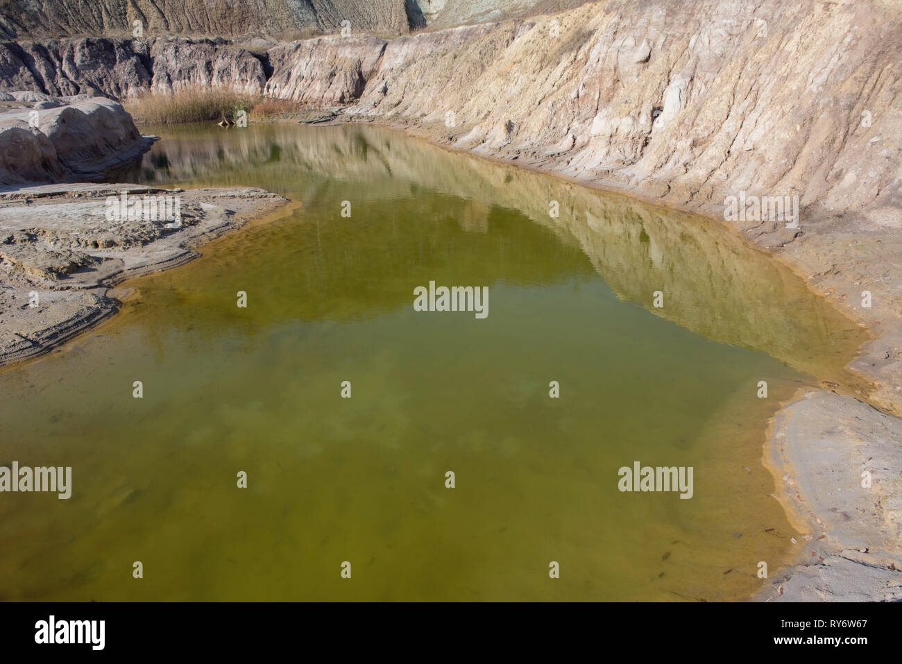 Polluted green industrial minewater from disused mine Stock Photo - Alamy