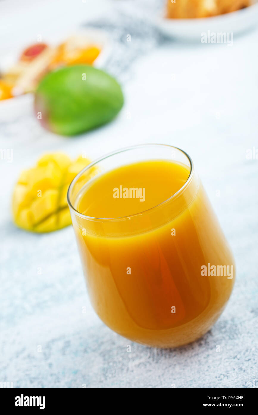 mango juice in glass, fresh juice and fruits Stock Photo - Alamy
