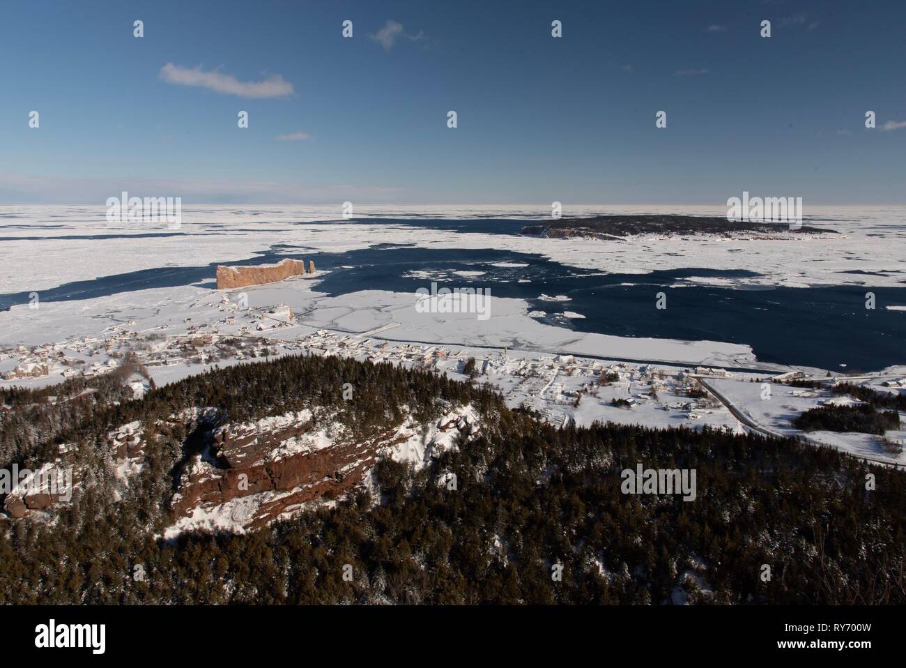 Winter view of the town of Percé from atop Mount Sainte-Anne with ...