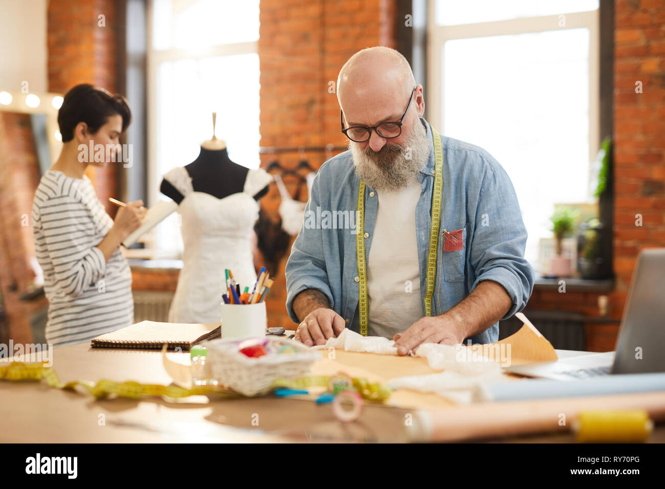 Tailor shop and owner hi-res stock photography and images - Alamy