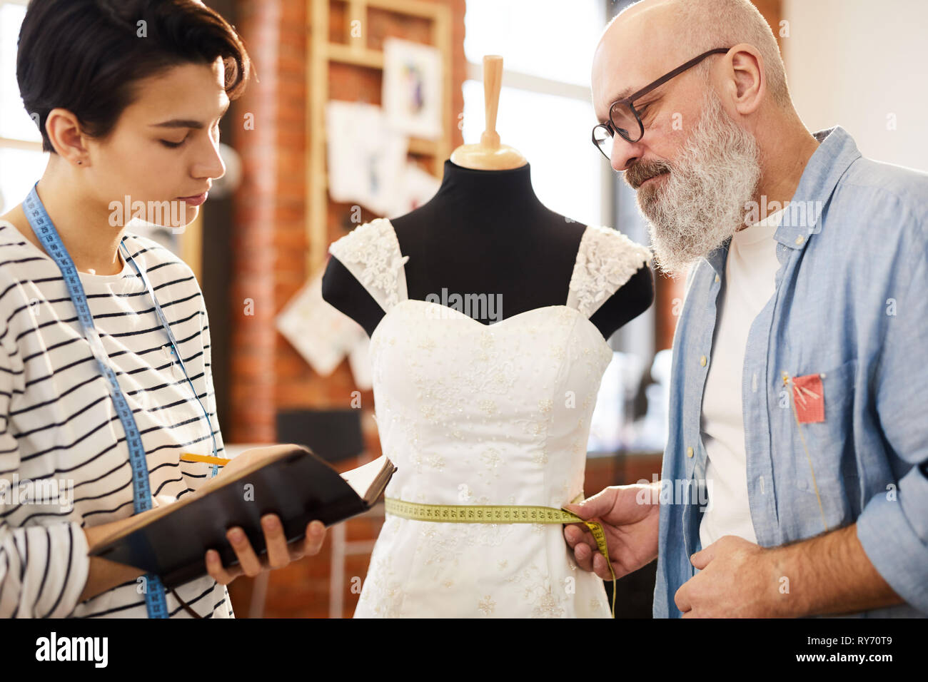 Fashion shop assistant man hi-res stock photography and images - Alamy