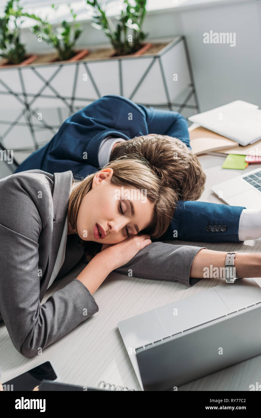 Businesspeople sleeping desk hi-res stock photography and images - Alamy
