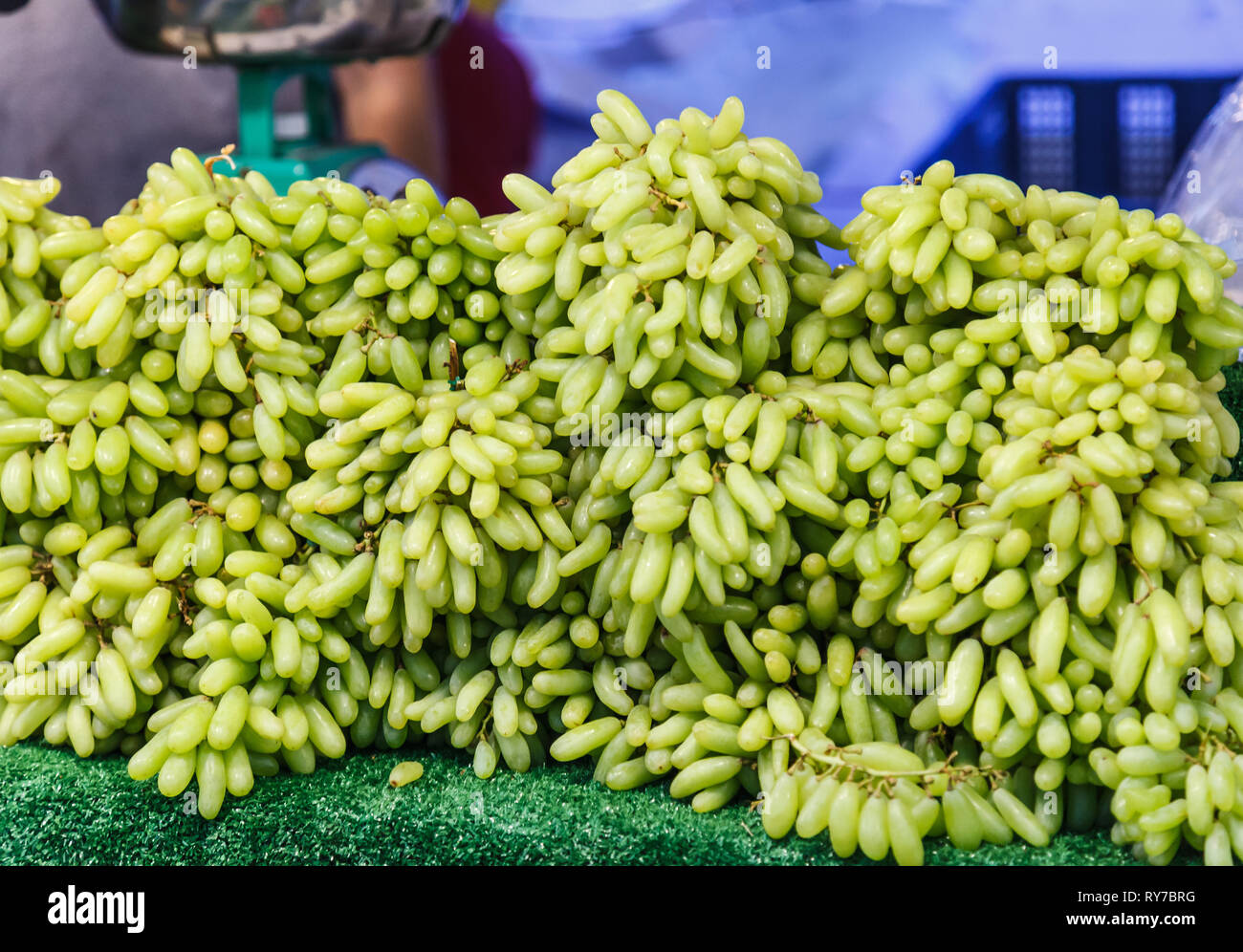 fresh natural wild tropical cluster of sweet Asian green raw ripe ...
