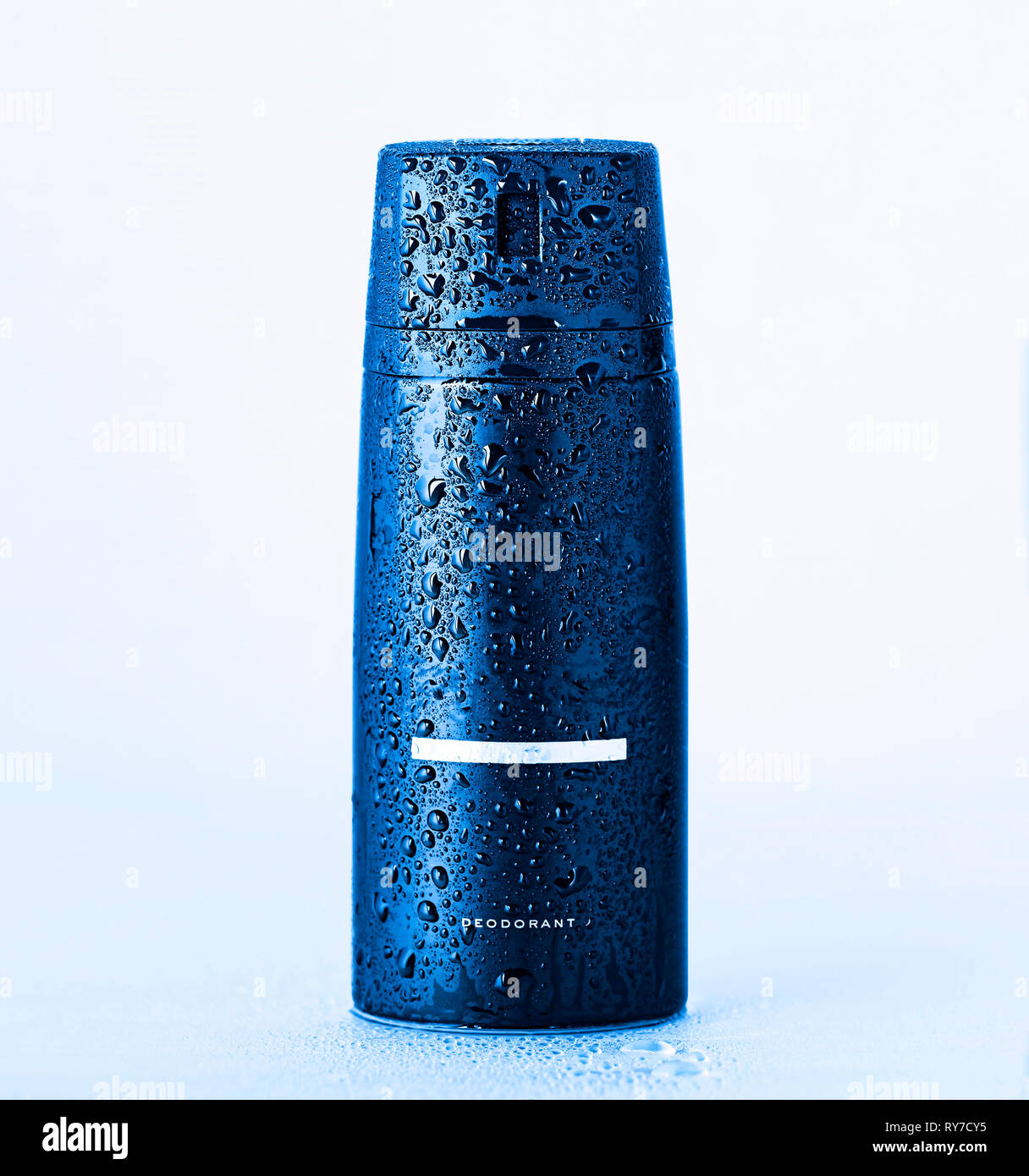 blue-black bottle aerosol deodorant shower gel with water droplets on ...