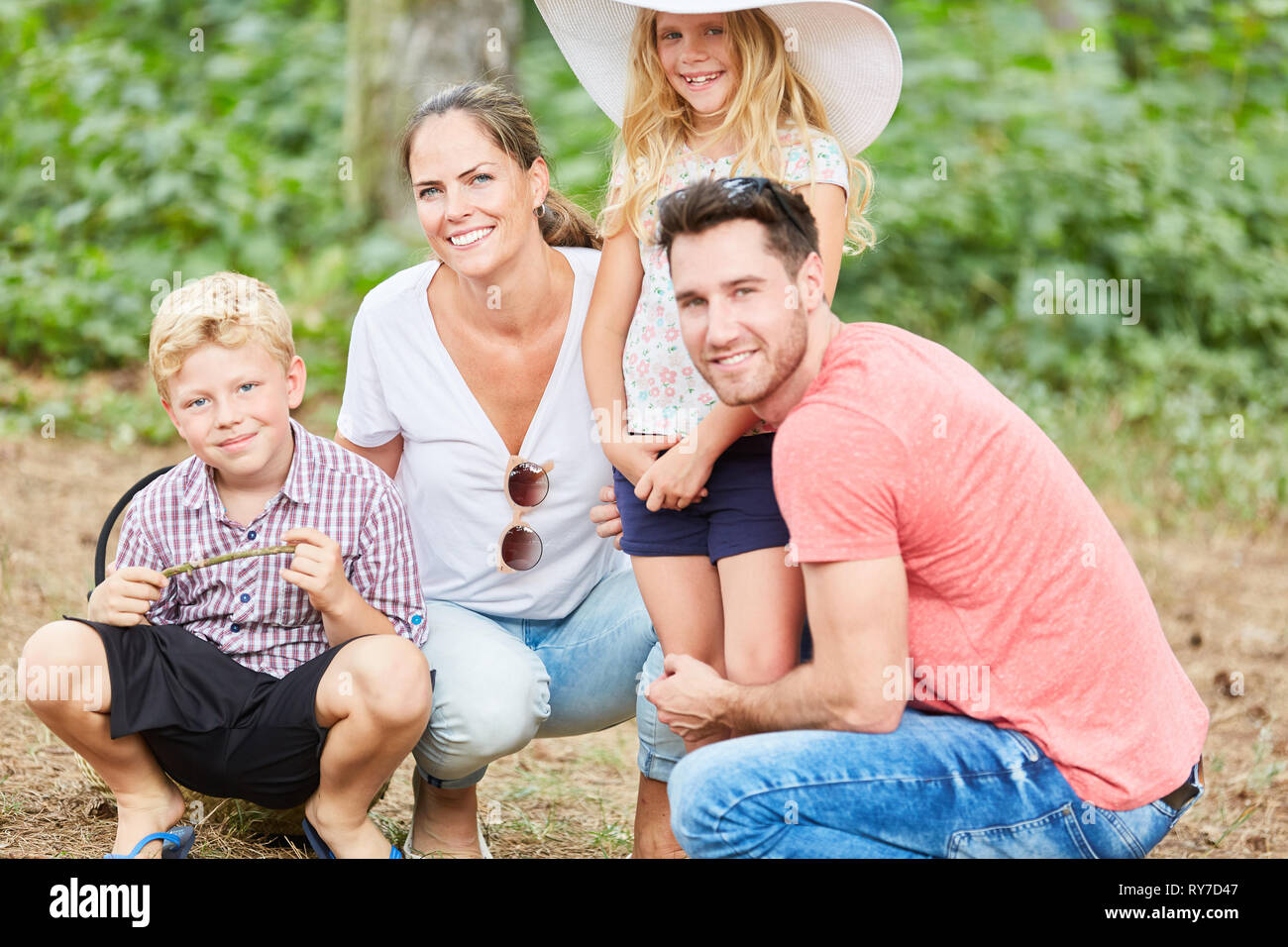 happy family with two kids on a trip in the nature in summer Stock ...