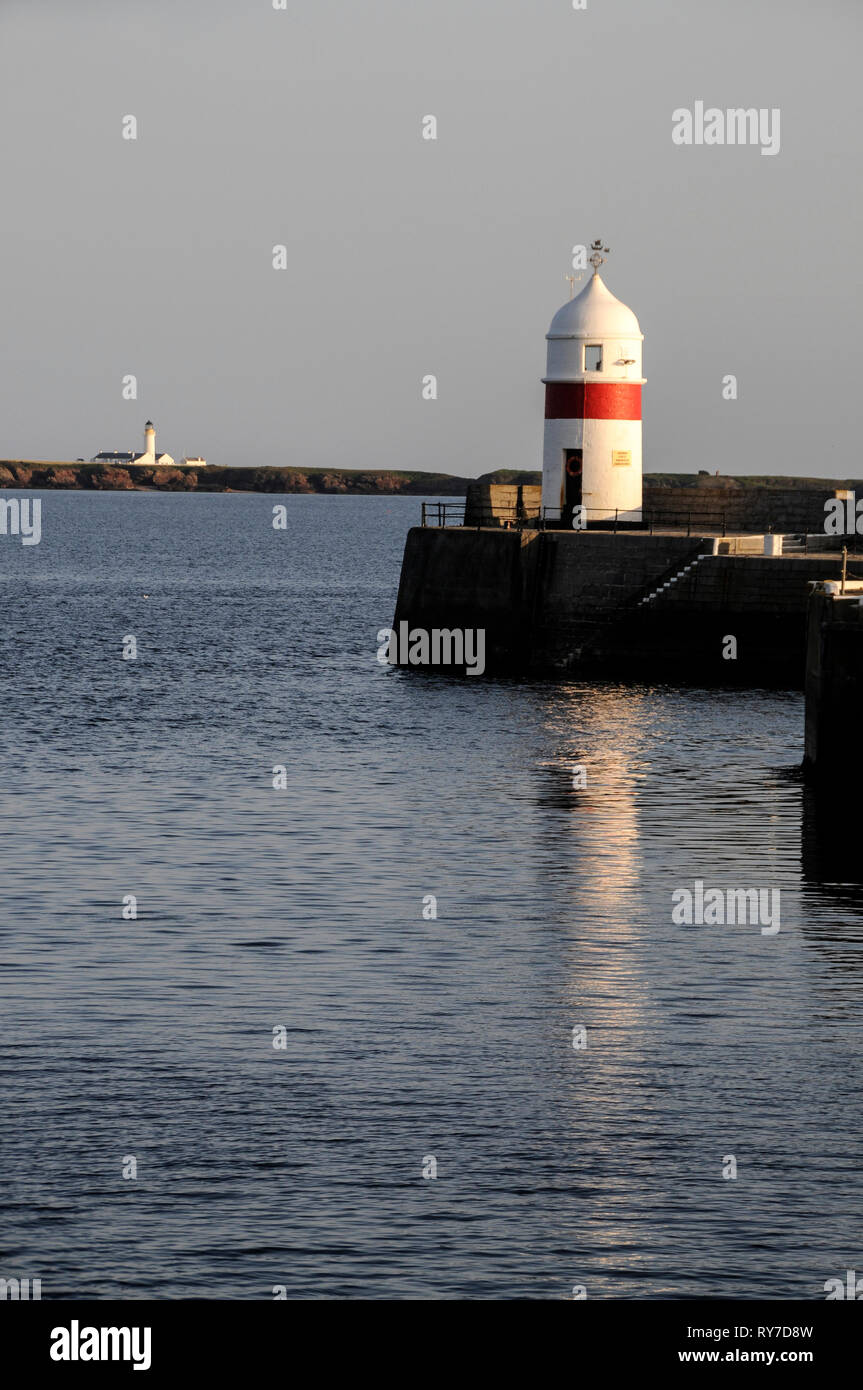 Harbour lights at the entrance to the harbour in Castletown on the ...