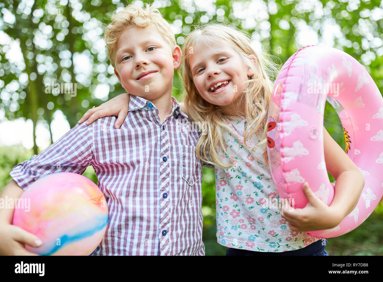 Happy siblings hi-res stock photography and images - Alamy
