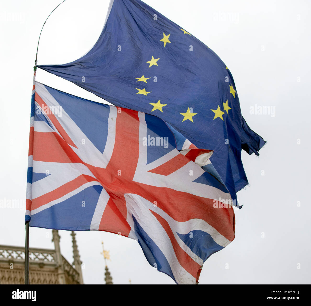 Union and EU flags fly outside the Palace of Westminster, London Stock ...