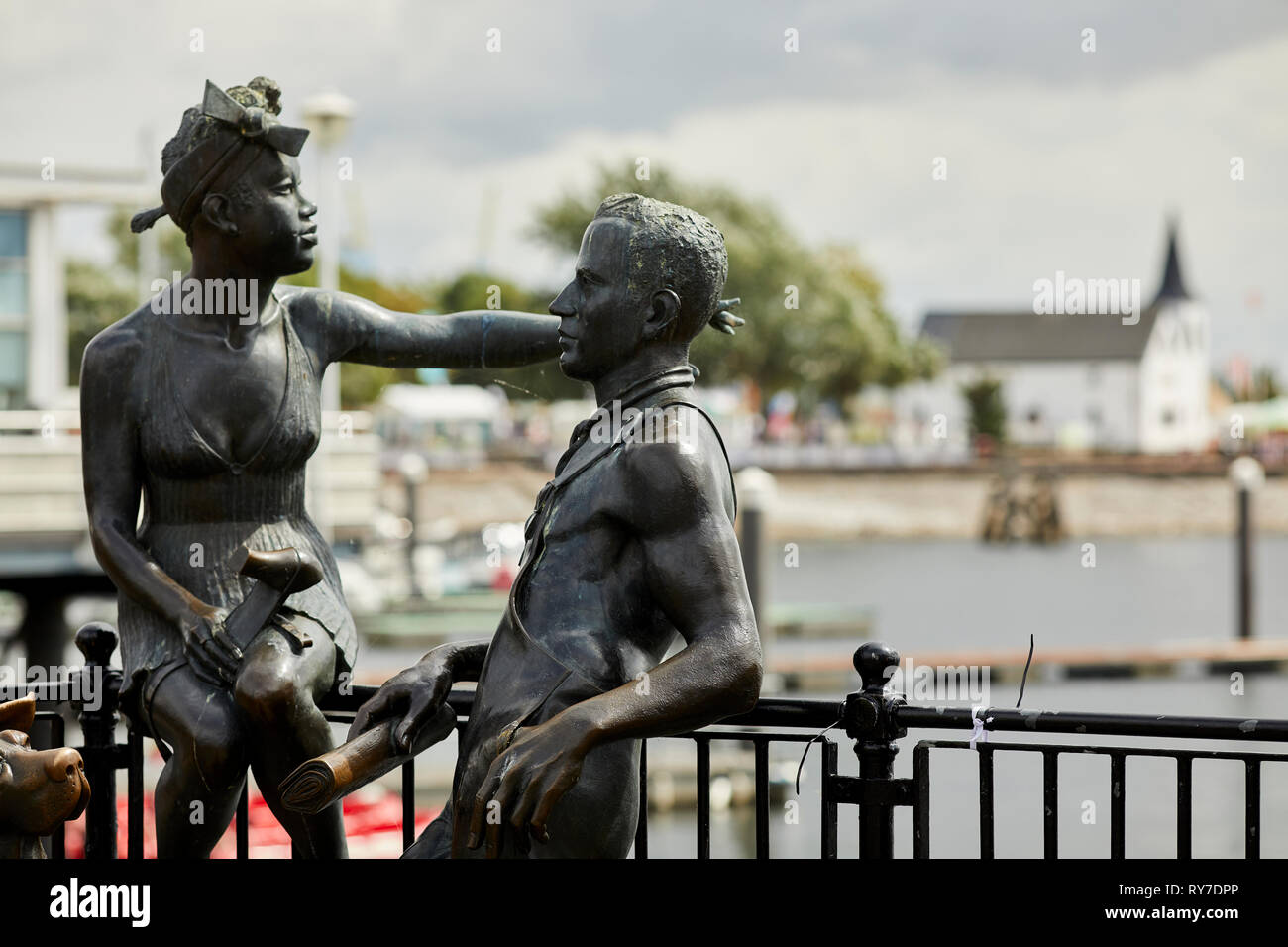 John Clinch's sculpture 'People Like Us' in Mermaid Quay with the ...