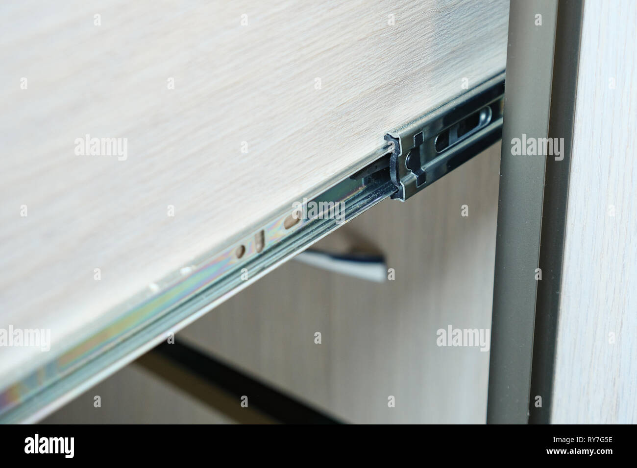 metal retractable mechanism for the promotion of shelves Stock Photo ...