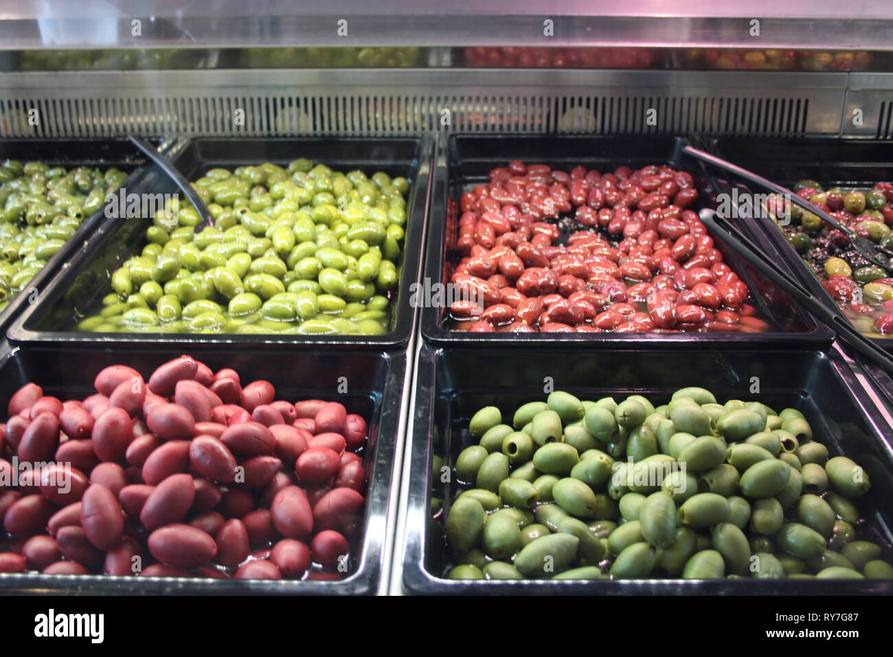 four different types of olives Stock Photo - Alamy
