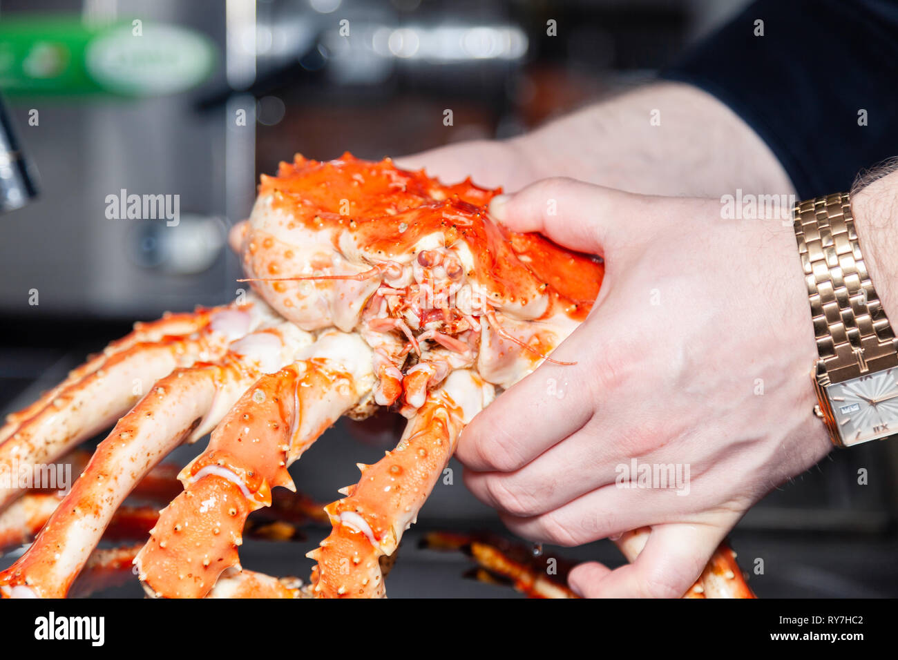Chef of premium michelin restaurant in white uniform is holding fresh ...
