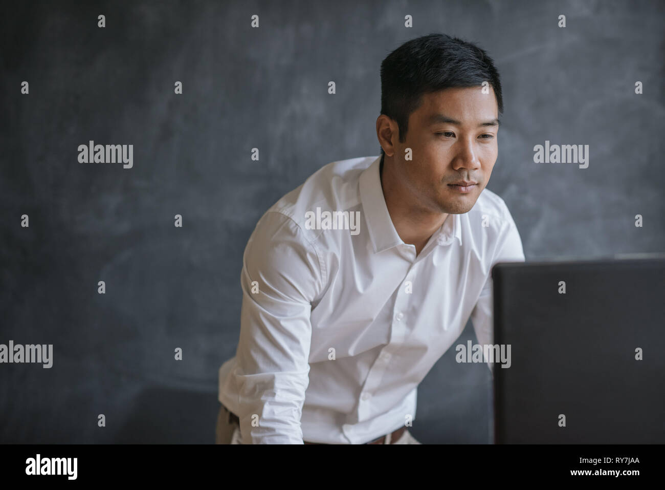 Asian person desktop computer hi-res stock photography and images - Alamy