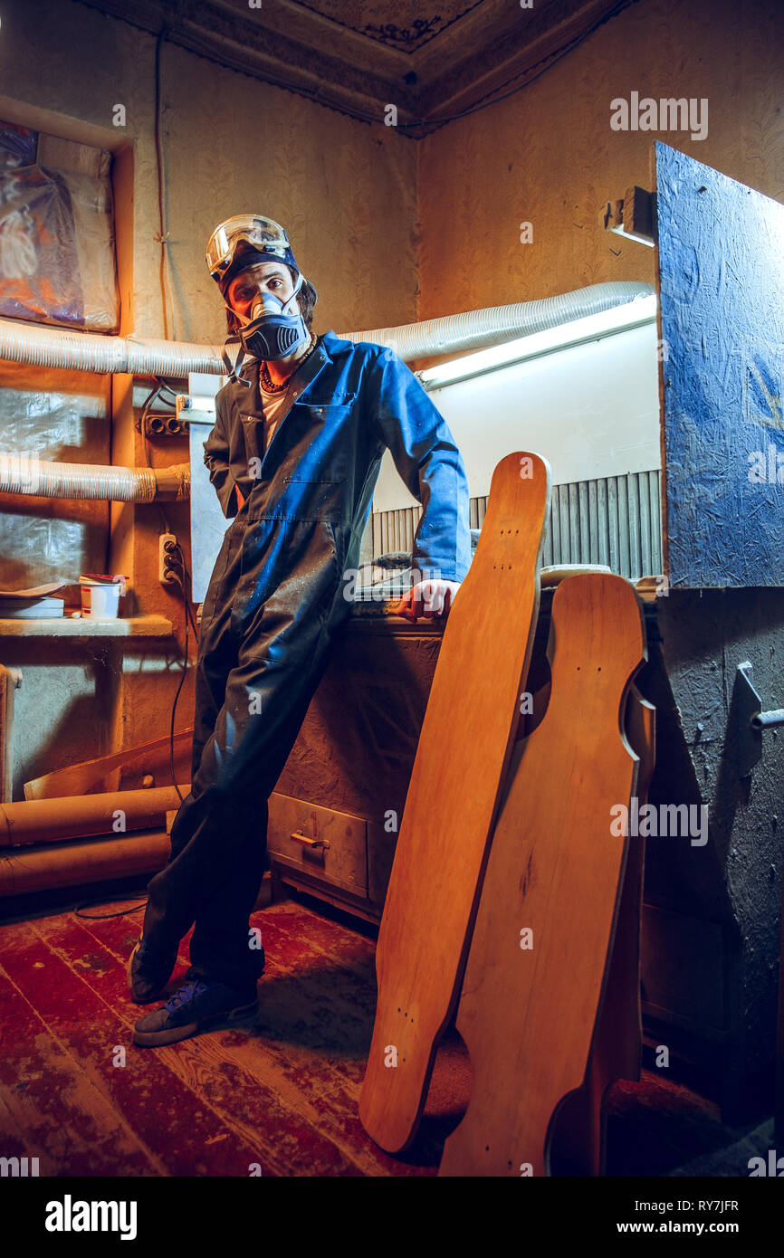 Portrait of serious carpenter at his work place Stock Photo - Alamy