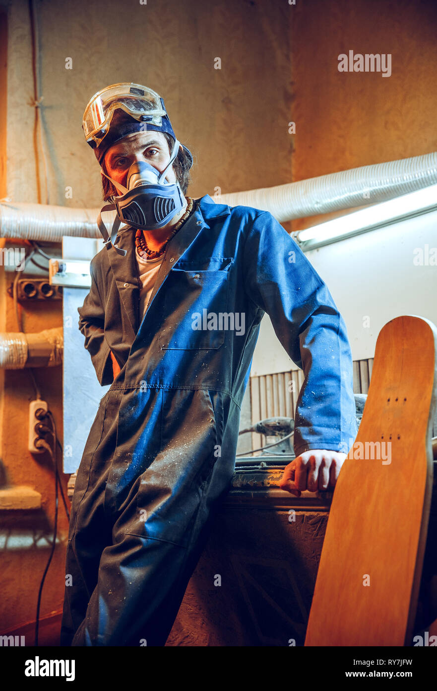 Portrait of serious carpenter at his work place Stock Photo - Alamy