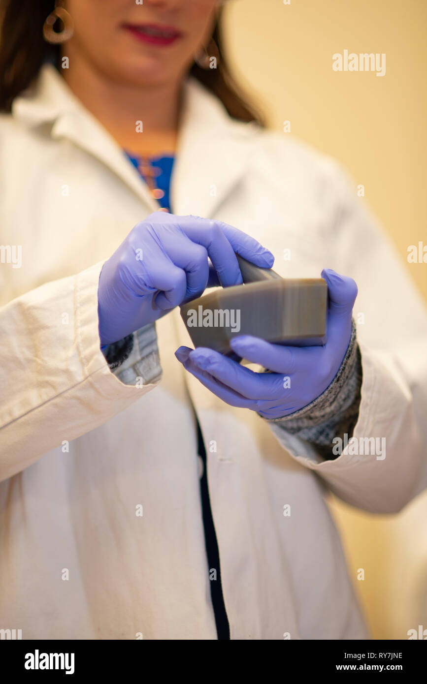 Female Scientist with Mortar and Pestle Stock Photo - Alamy