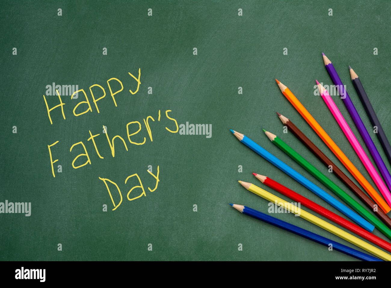 Happy father's day text and heart drawing on green chalkborad Stock ...