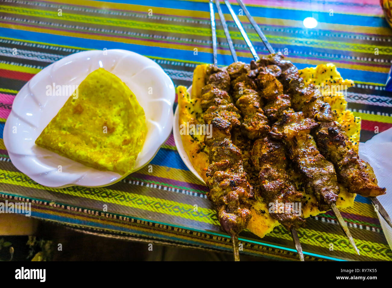 Uyghur Traditional Hot Spicy Lamb Skewers with Cumin and Naan Bread ...