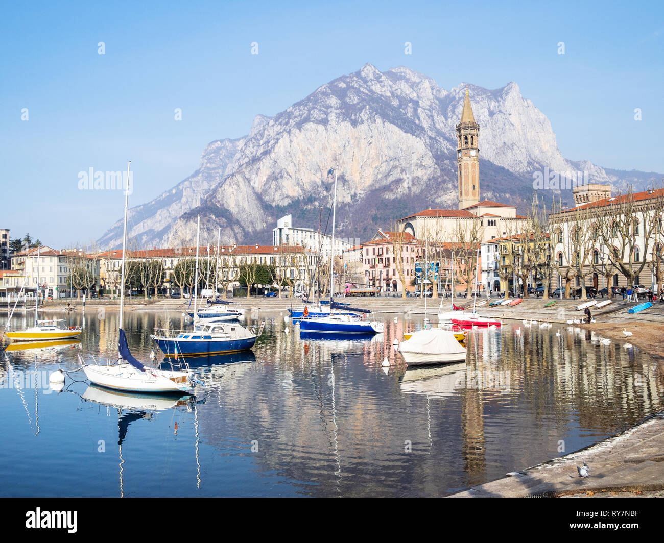 LECCO, ITALY - FEBRUARY 20, 2019: yacht mooring near waterfront at ...