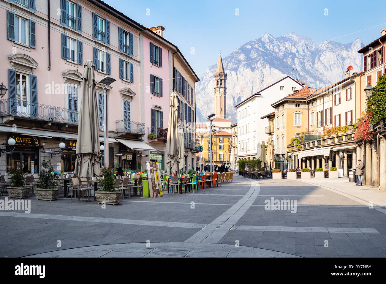 LECCO, ITALY - FEBRUARY 20, 2019: people in outdoor cafe on square ...