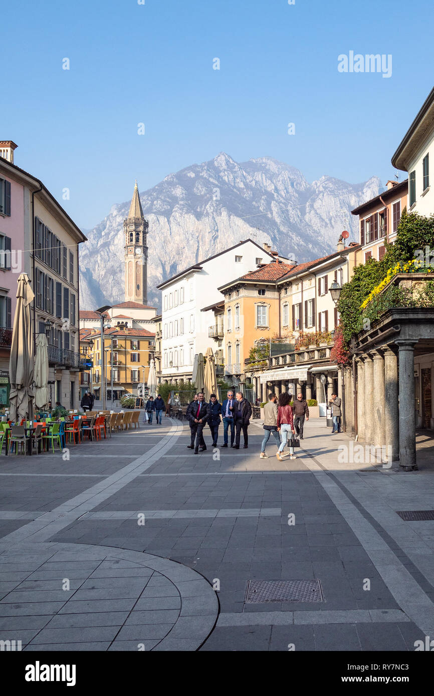 LECCO, ITALY - FEBRUARY 20, 2019: people walk on square Piazza XX ...