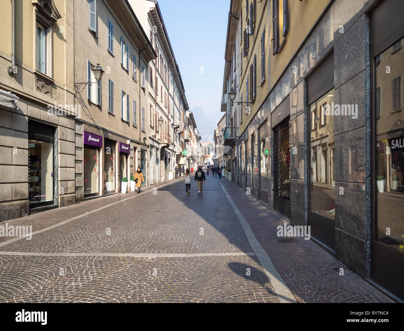 LECCO, ITALY - FEBRUARY 20, 2019: people walk on street via Camillo ...