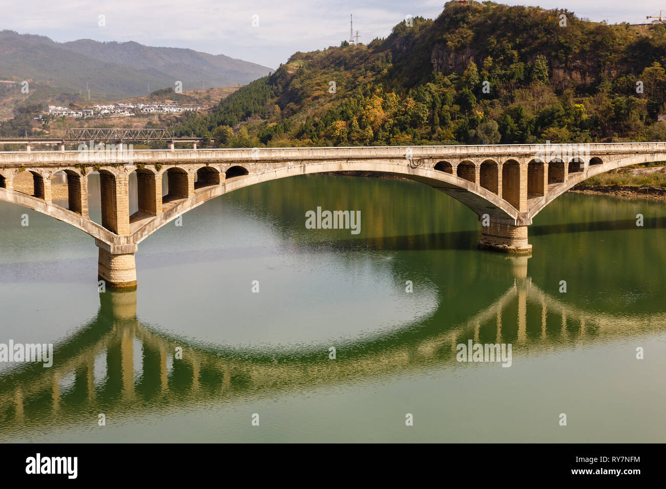 ancient stone bridge over the Bailong River, China Stock Photo - Alamy