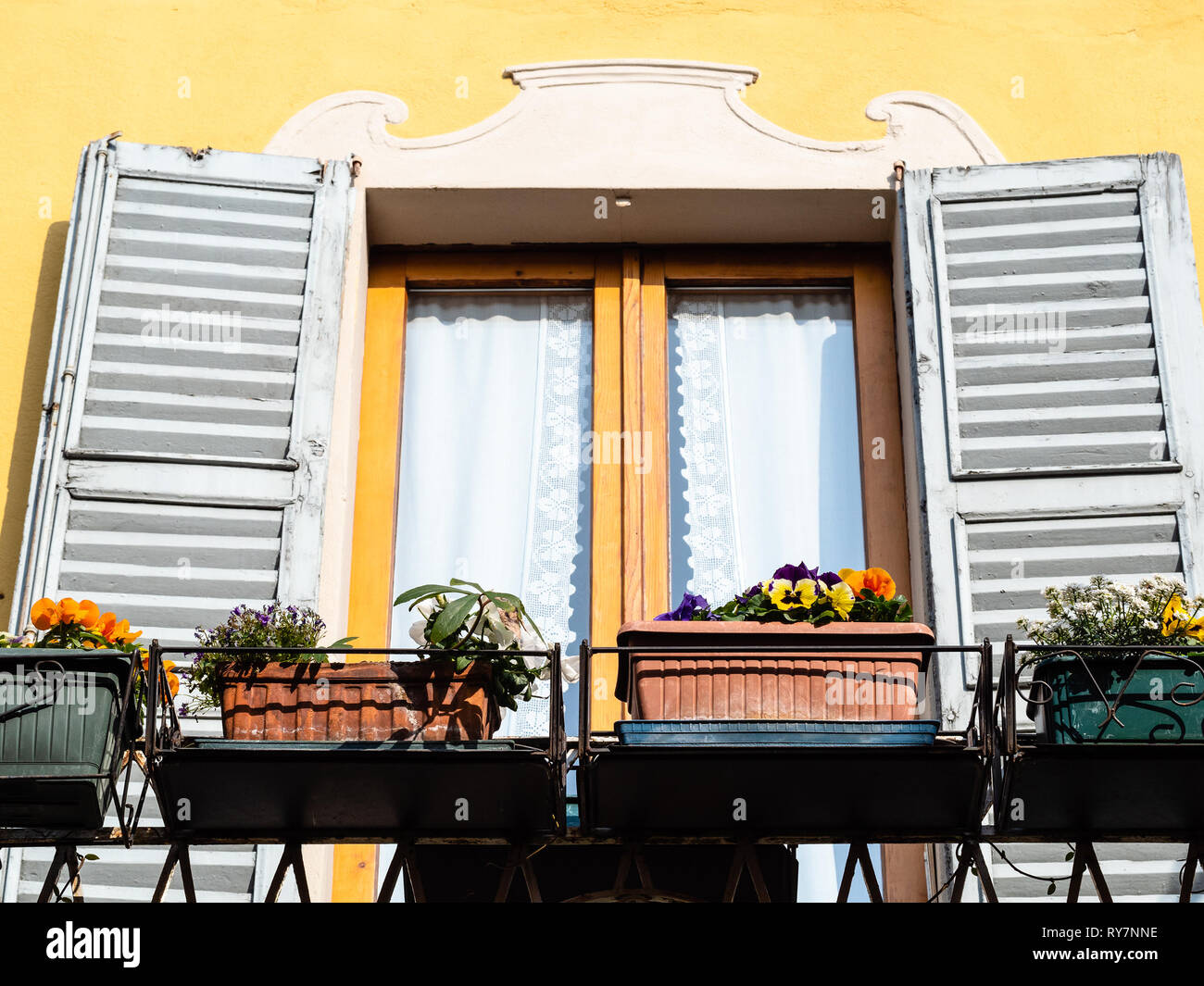 Travel to Italy - street window in medieval house in Lecco town ...