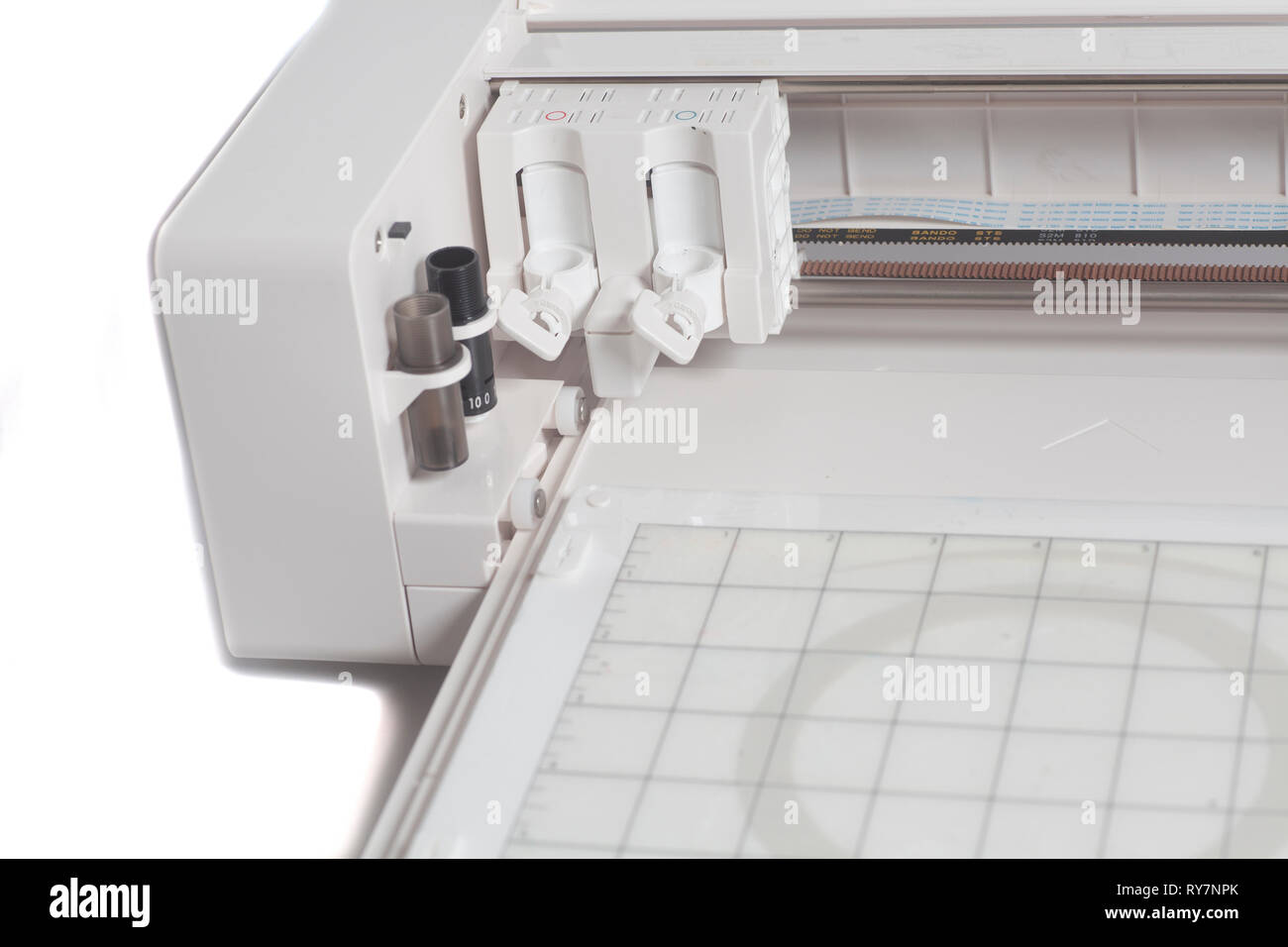 Cutting plotter isolated on a white background Stock Photo - Alamy