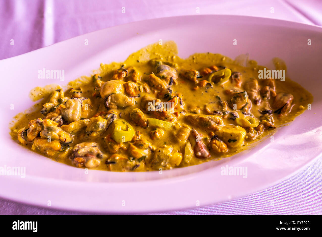 Greek Traditional Mussels Midia Saganaki with Green Sliced Pepper on an ...