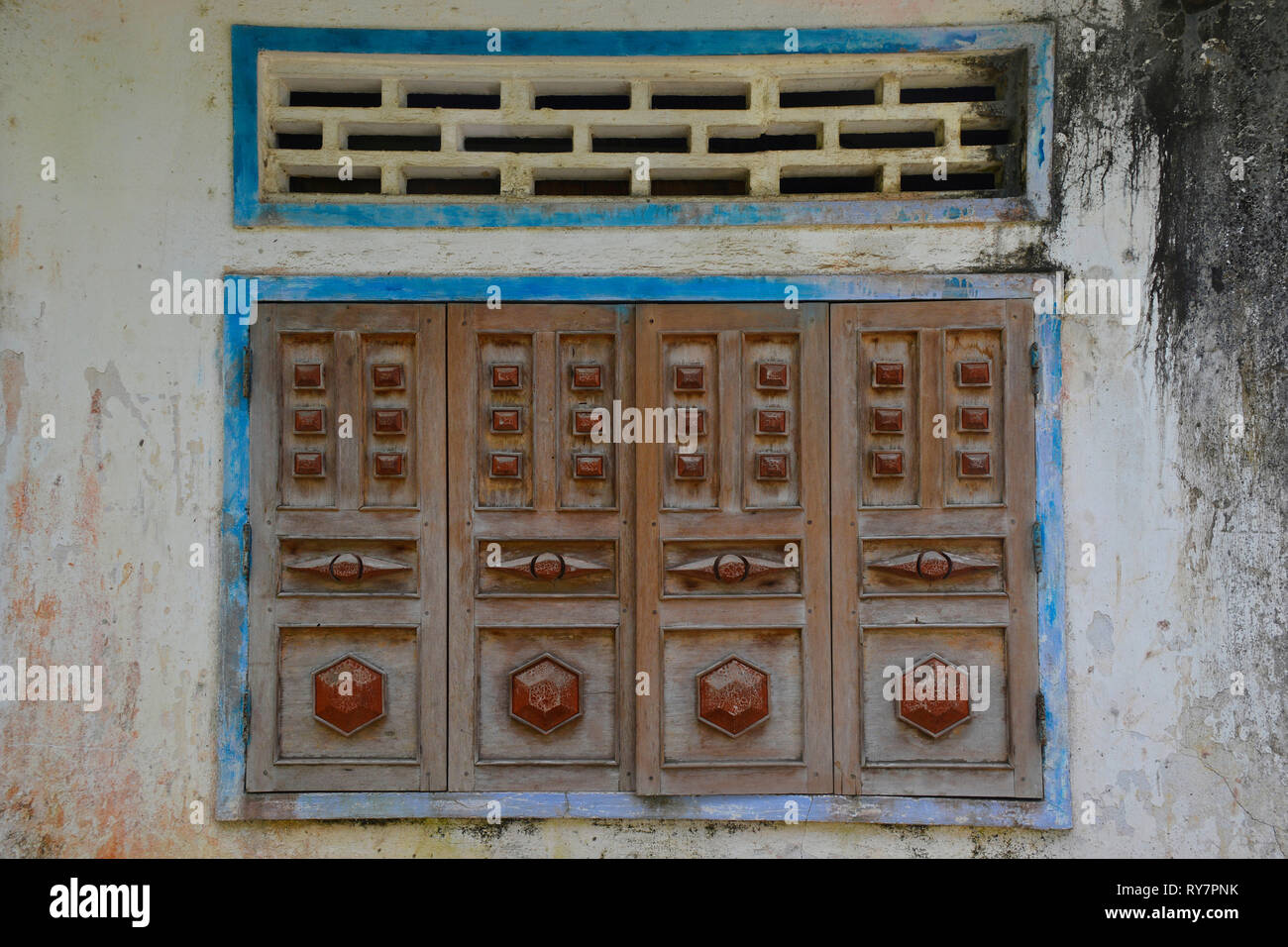 A window in a disused building in a rural part of Can Tho in Vietnam's ...