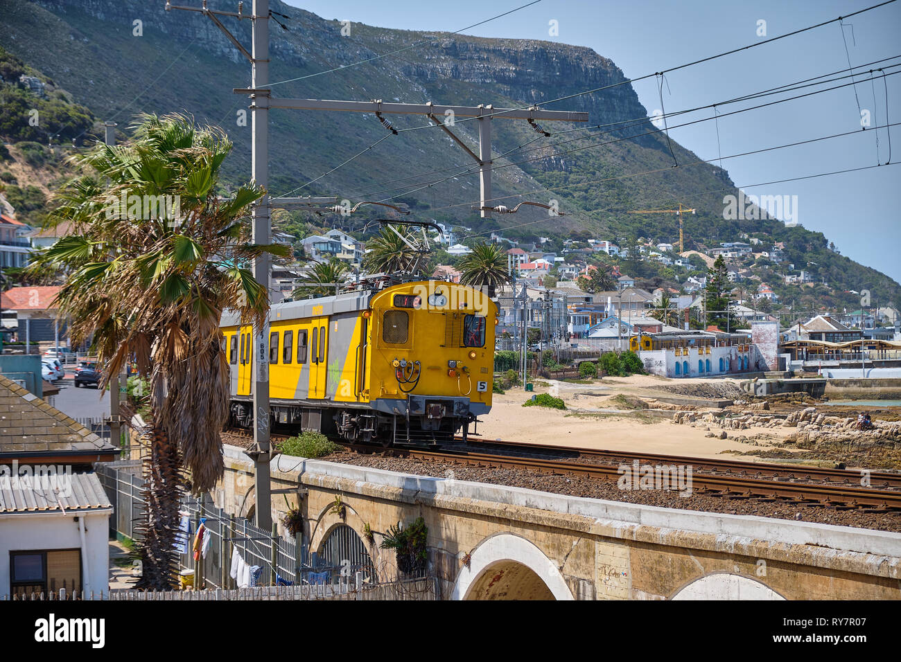Metrorail train leaving the Kalk Bay station, in the southern suburbs ...
