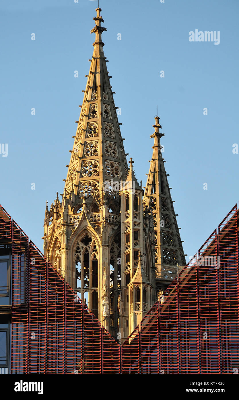 view to eastern steeples of gothic minster in Ulm in evening sun ...