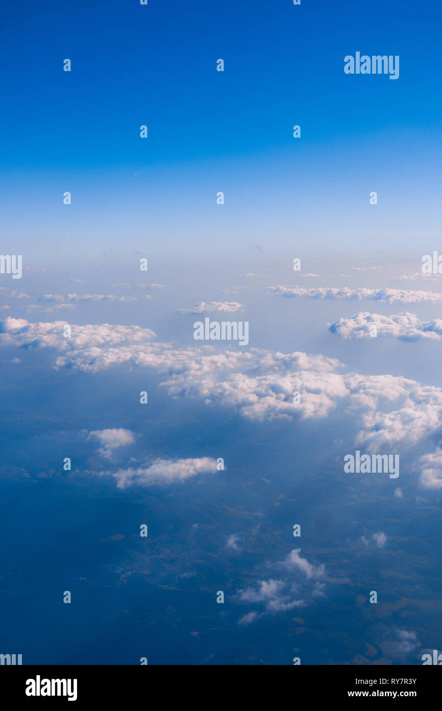 clouds from airplane window Stock Photo - Alamy