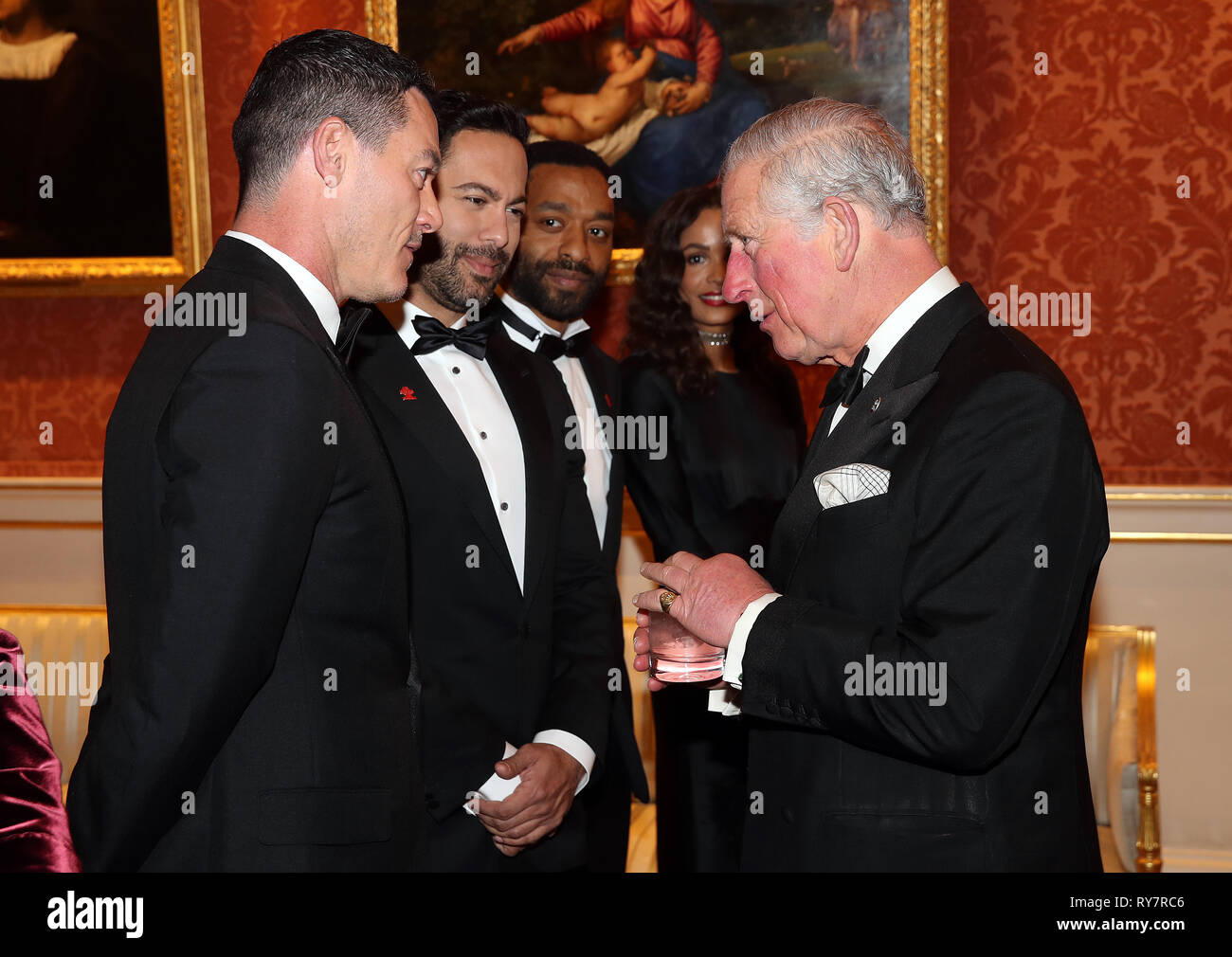 The Prince of Wales speaks to Luke Evans (left) at a dinner for donors ...