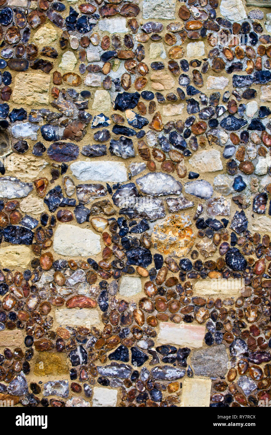 A knapped flint and rock wall, Suffolk, England, UK Stock Photo - Alamy