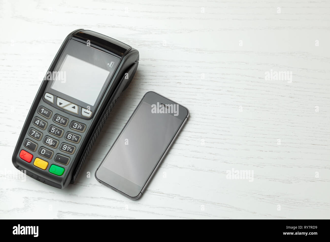 POS terminal, Payment Machine with mobile phone on white background ...