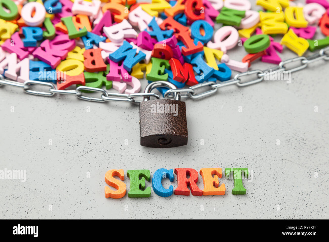 Secret Information. Letters of information symbol wrapped in chain and ...
