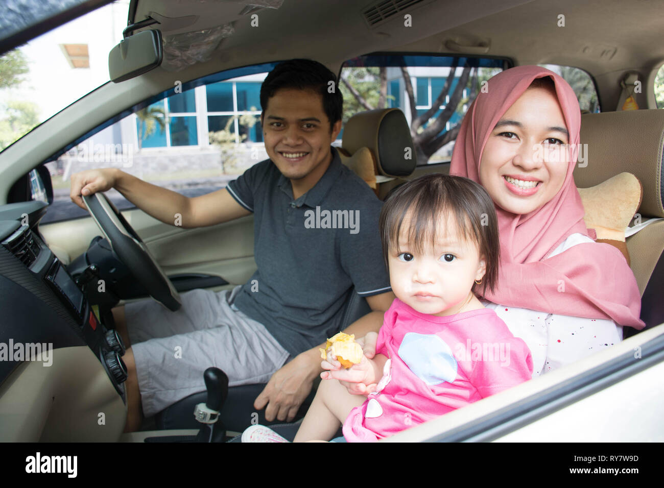 young muslim family , transport, leisure, road trip and people concept ...