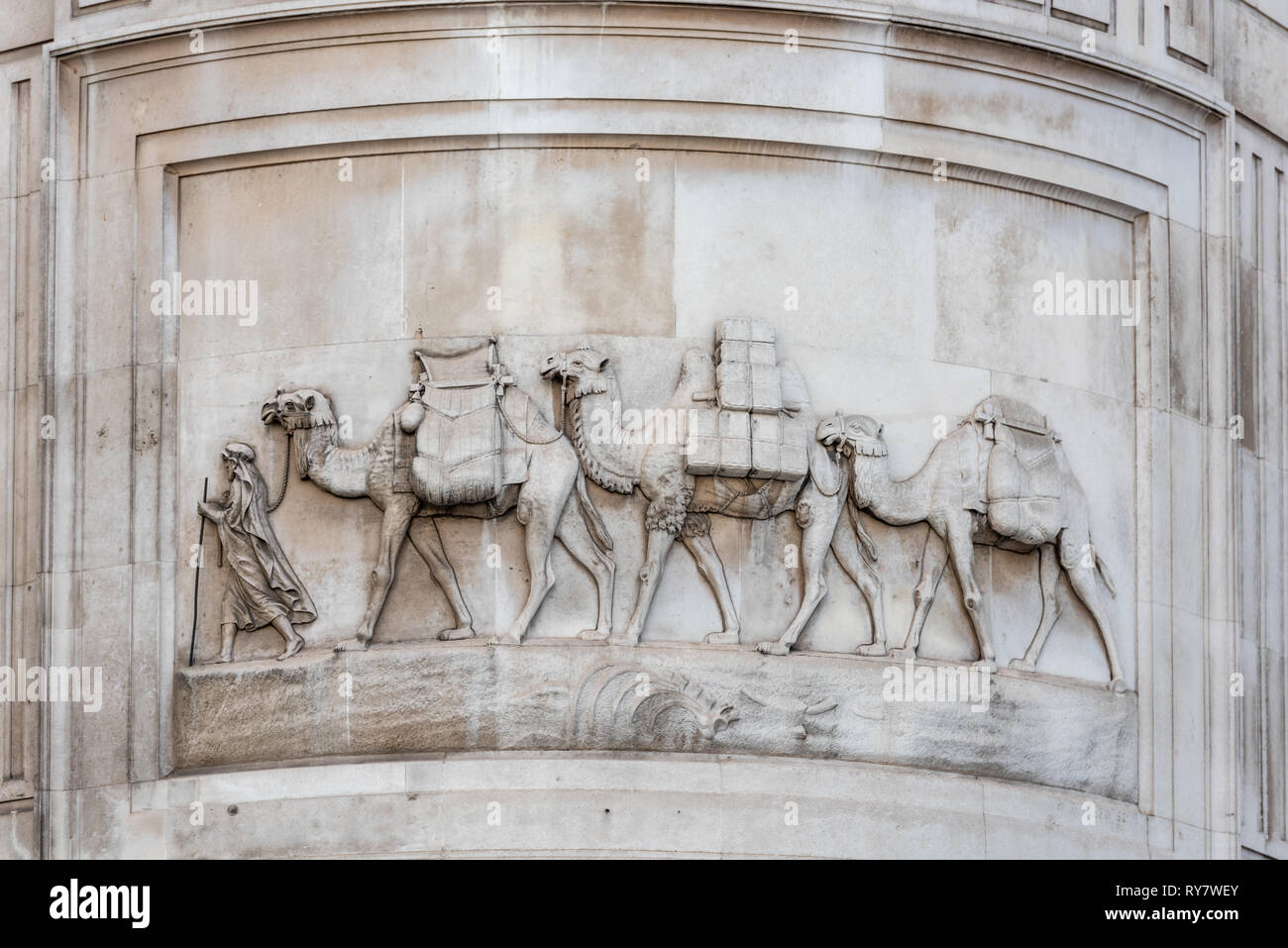 An unlikely sight on a City of London building. A camel train of coffee ...