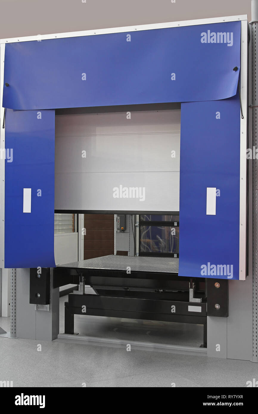 Loading Cargo Door Ramp at Distribution Centre Fulfillment Warehouse ...