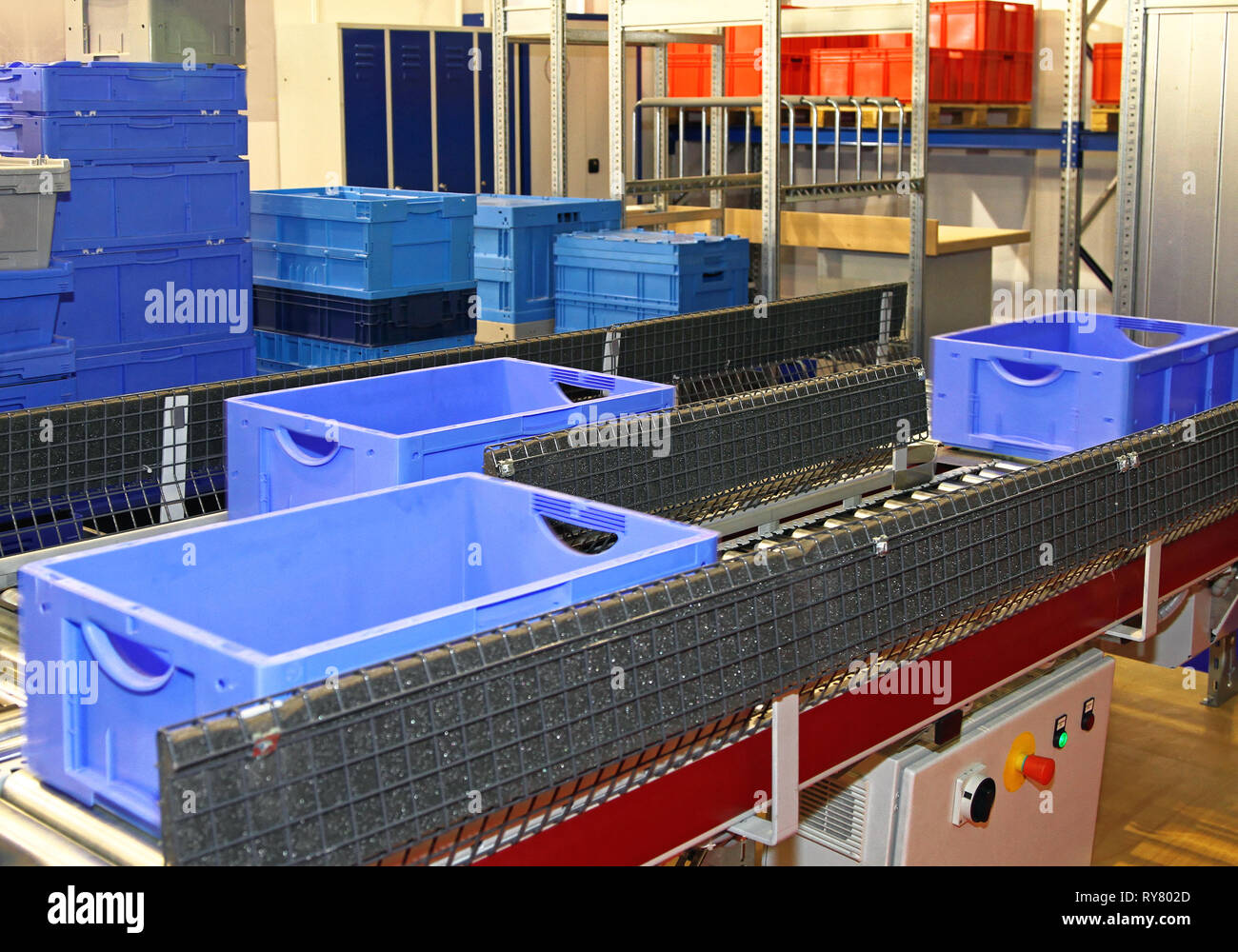 Plastic Crates at Conveyor Rollers in Factory Production Stock Photo ...
