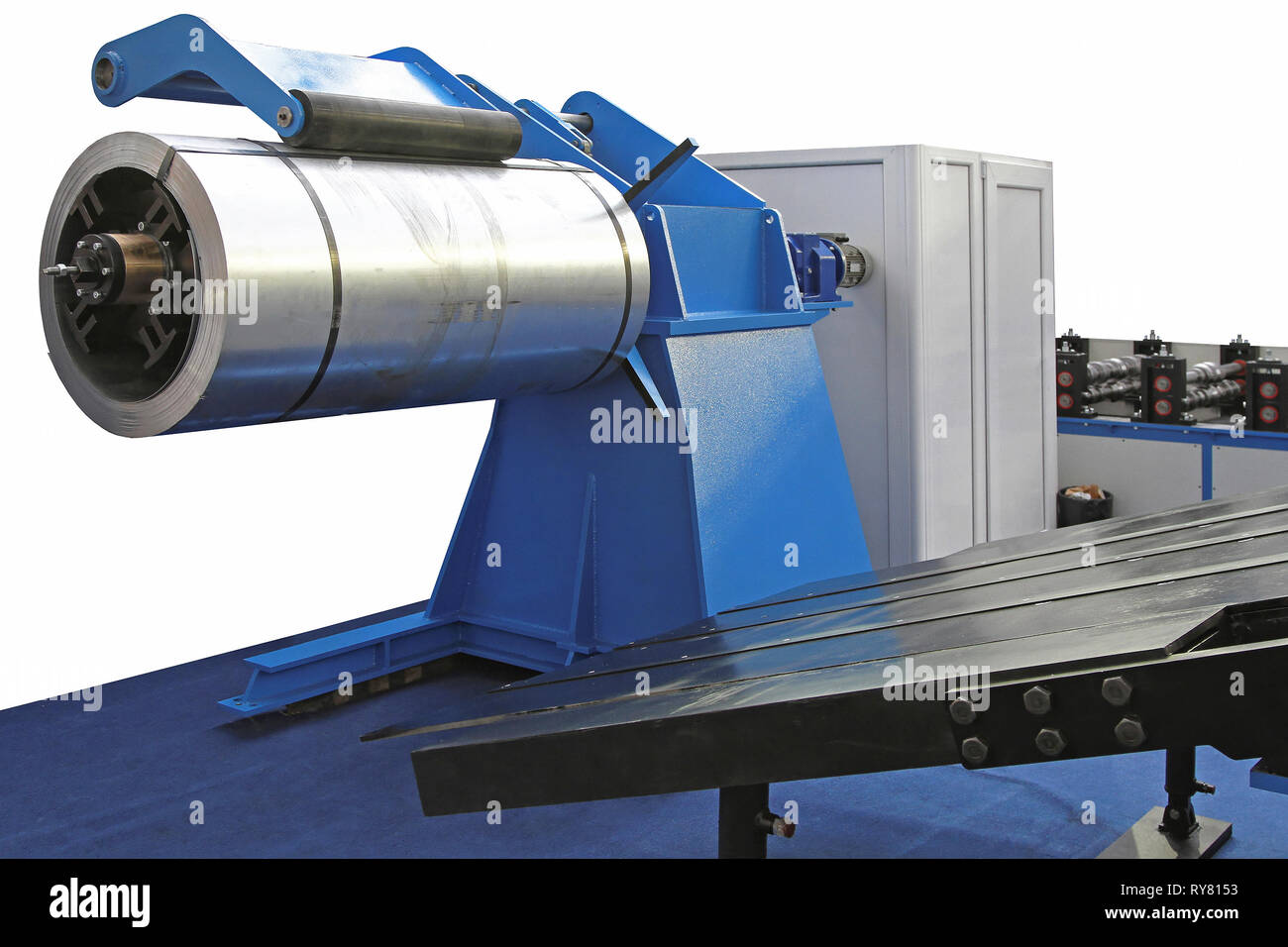 Big Roll of Metal Feed in Rolling Factory Machine Stock Photo - Alamy