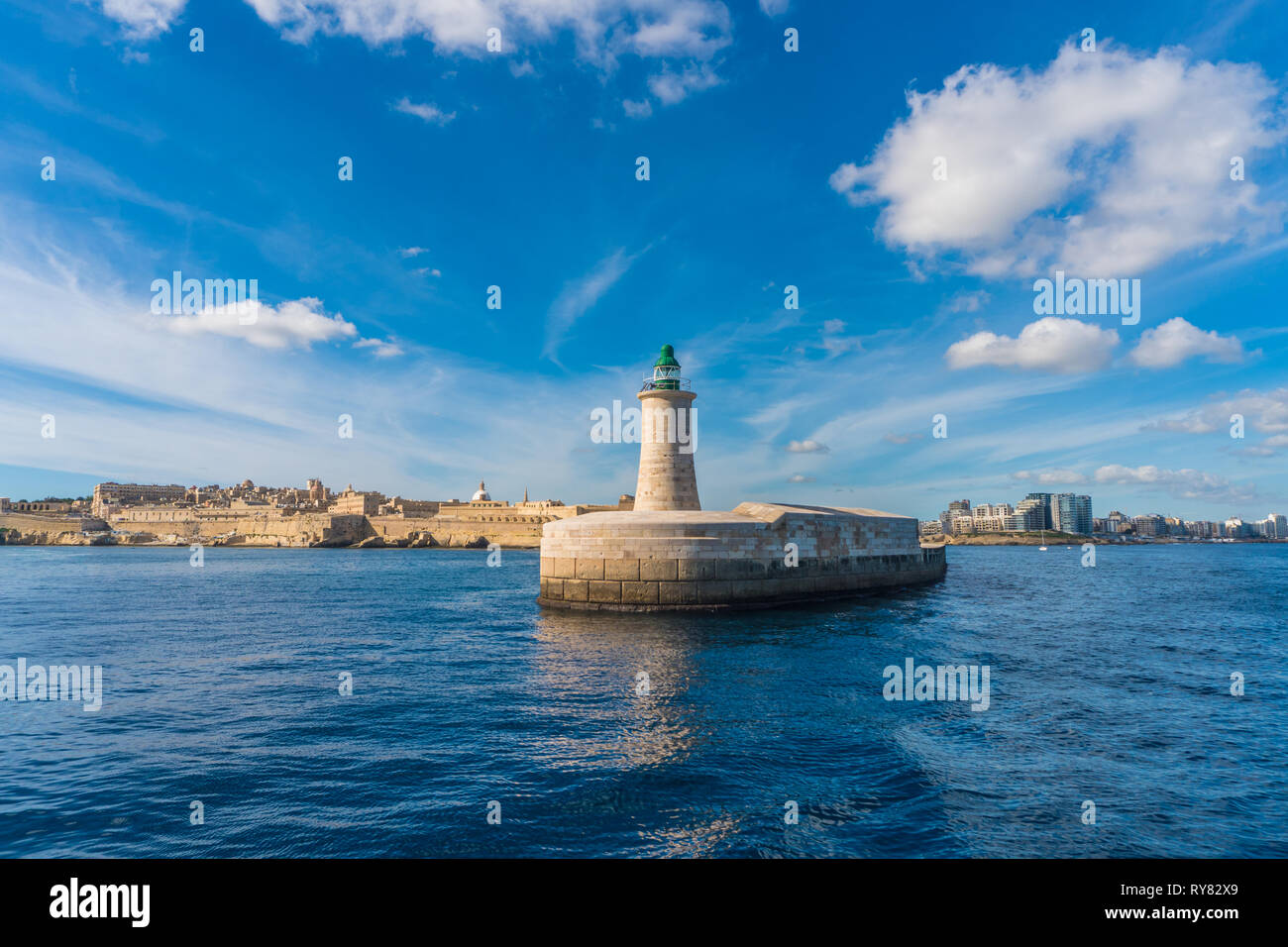 Green Lighthouse in the Grand Harbour in Valletta city - capital of ...