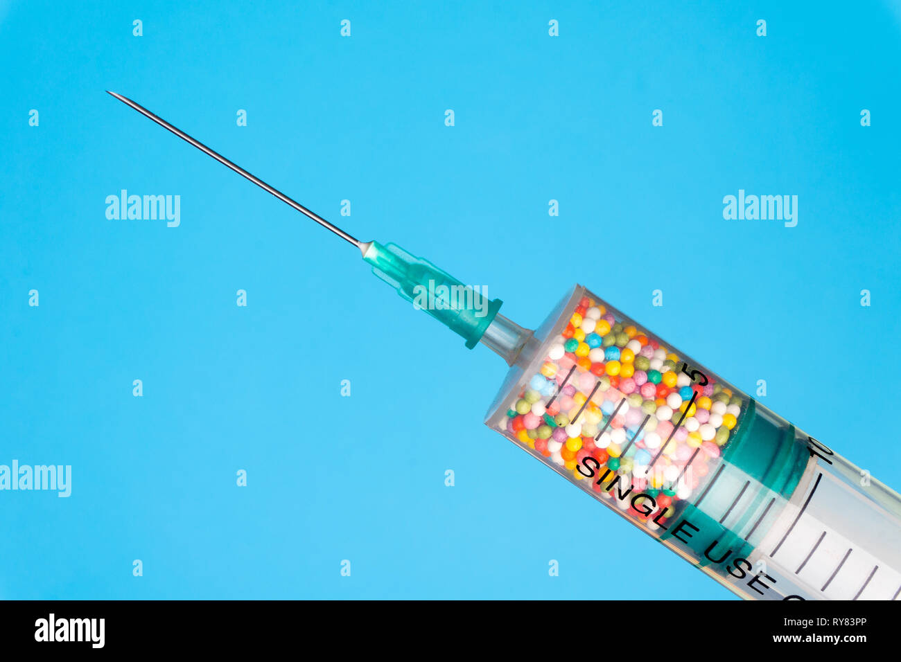 Minimal Creative syringe with color drugs ( vitamins, dyes, antibiotics ...