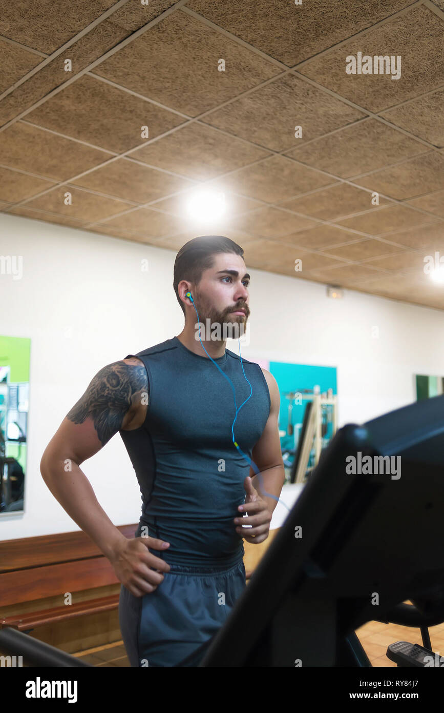 Person on running machine hi-res stock photography and images - Alamy