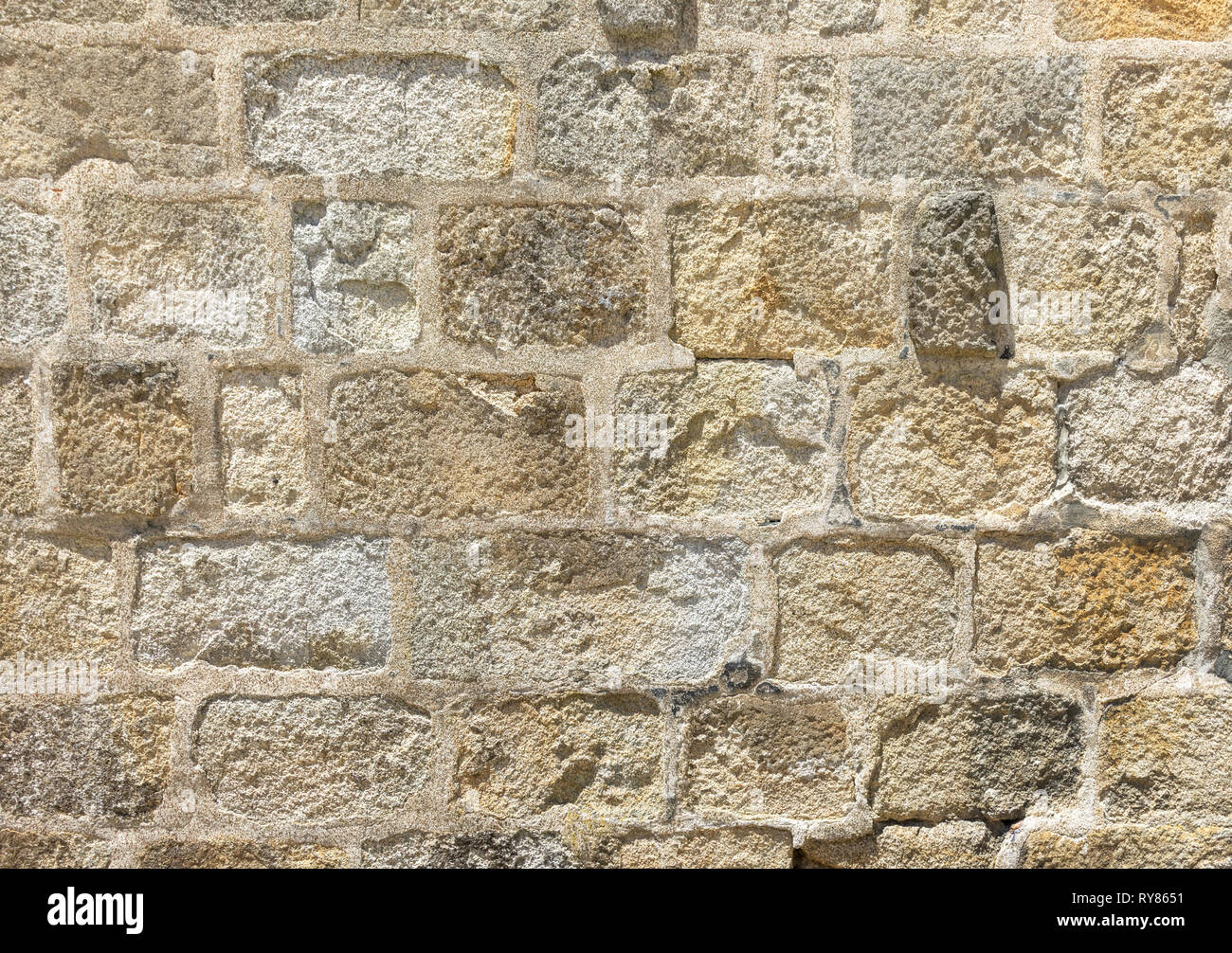 Decorative wall of colored stone bricks. Abstract background Stock ...