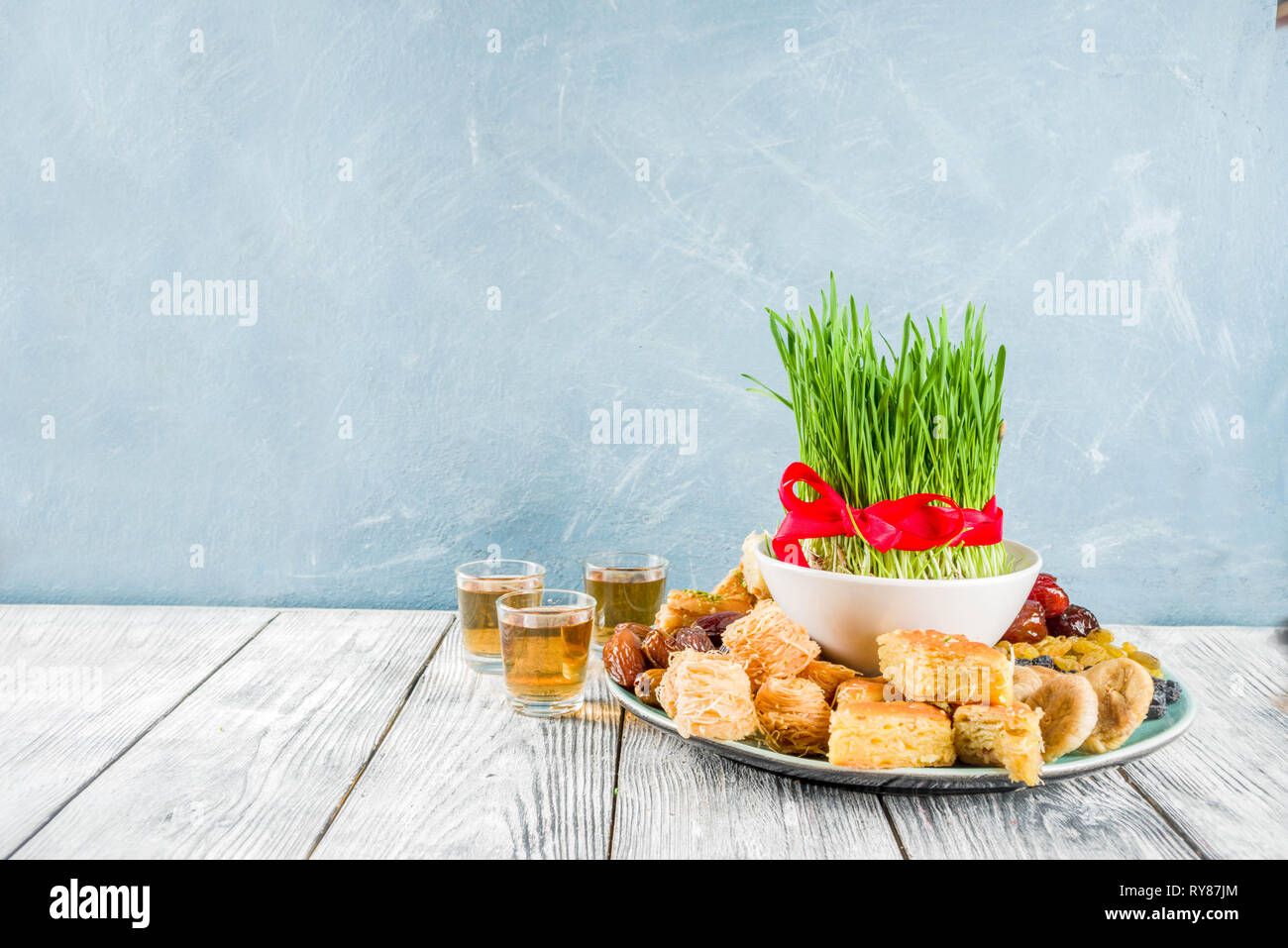 Happy Nowruz holiday background. Celebrating Nowruz sweets and treats ...