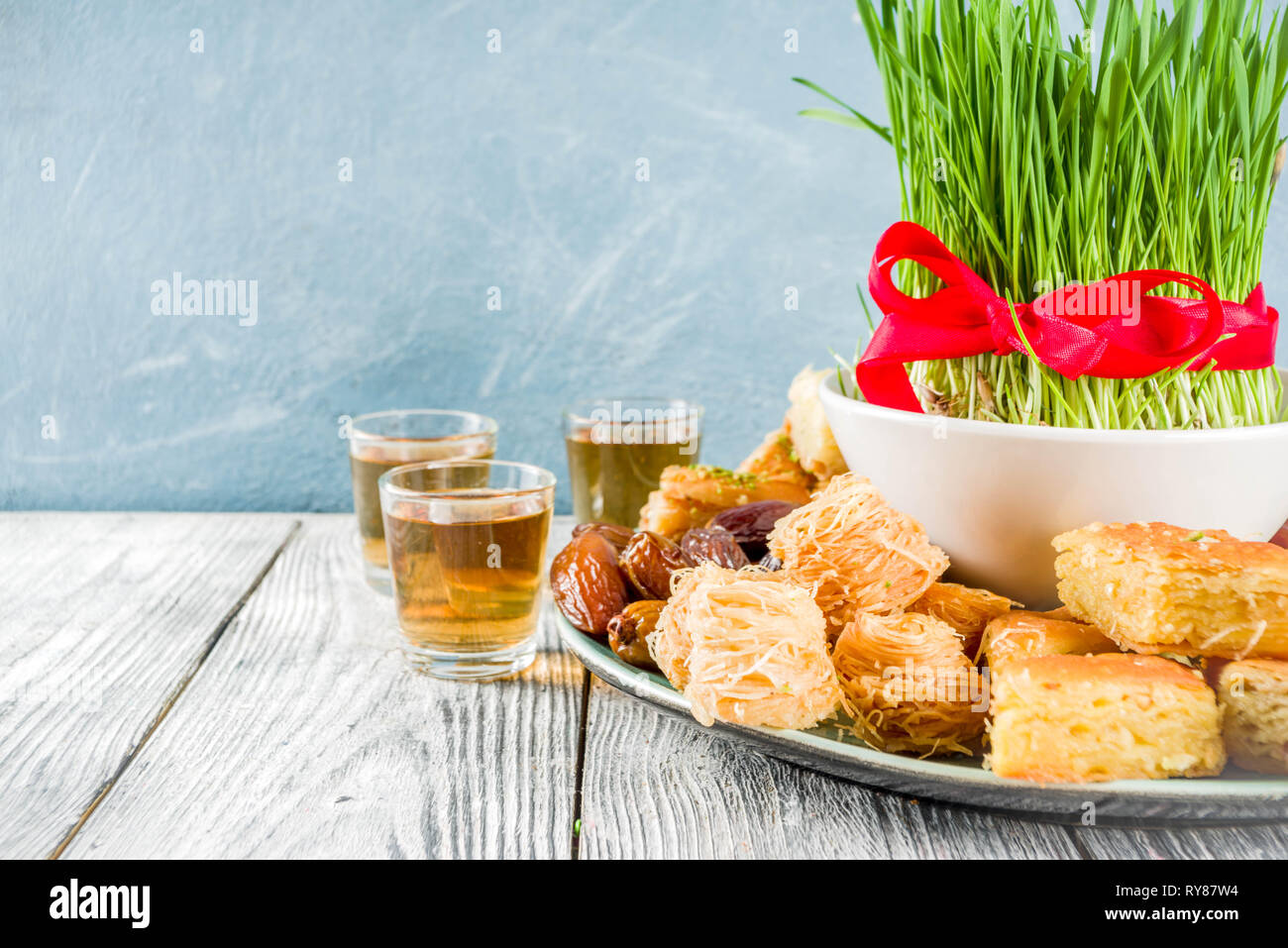 Happy Nowruz holiday background. Celebrating Nowruz sweets and treats ...