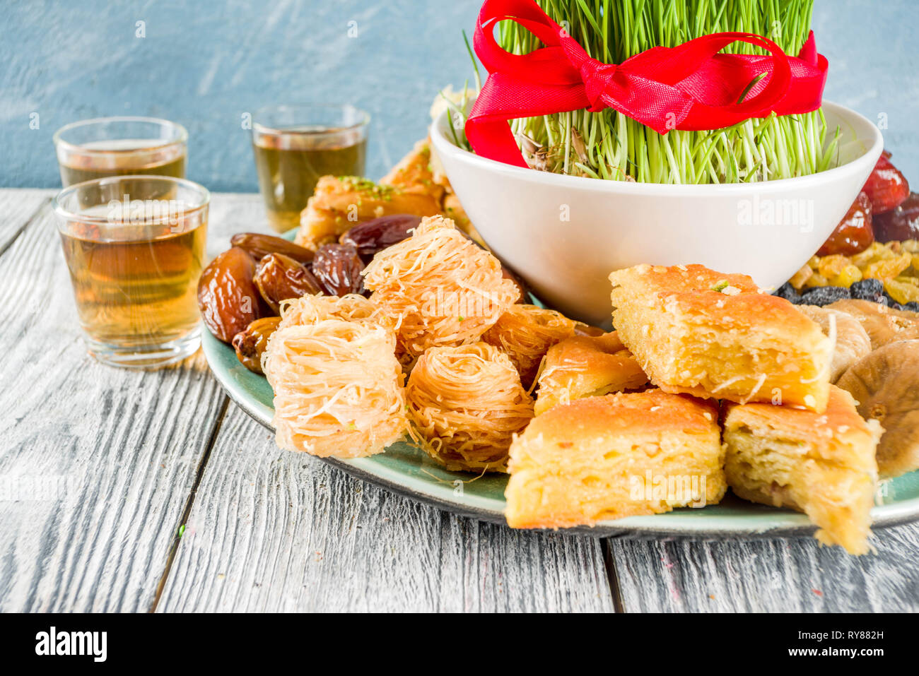 Happy Nowruz holiday background. Celebrating Nowruz sweets and treats ...